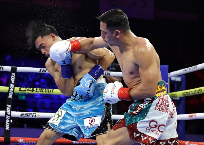 Photos: Angelo Leo KO's Luis Alberto Lopez to become two-weight ...