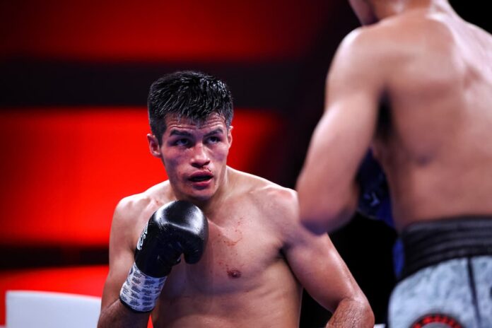 Live results: Christian Medina beats Adrian Curiel to retain title ...